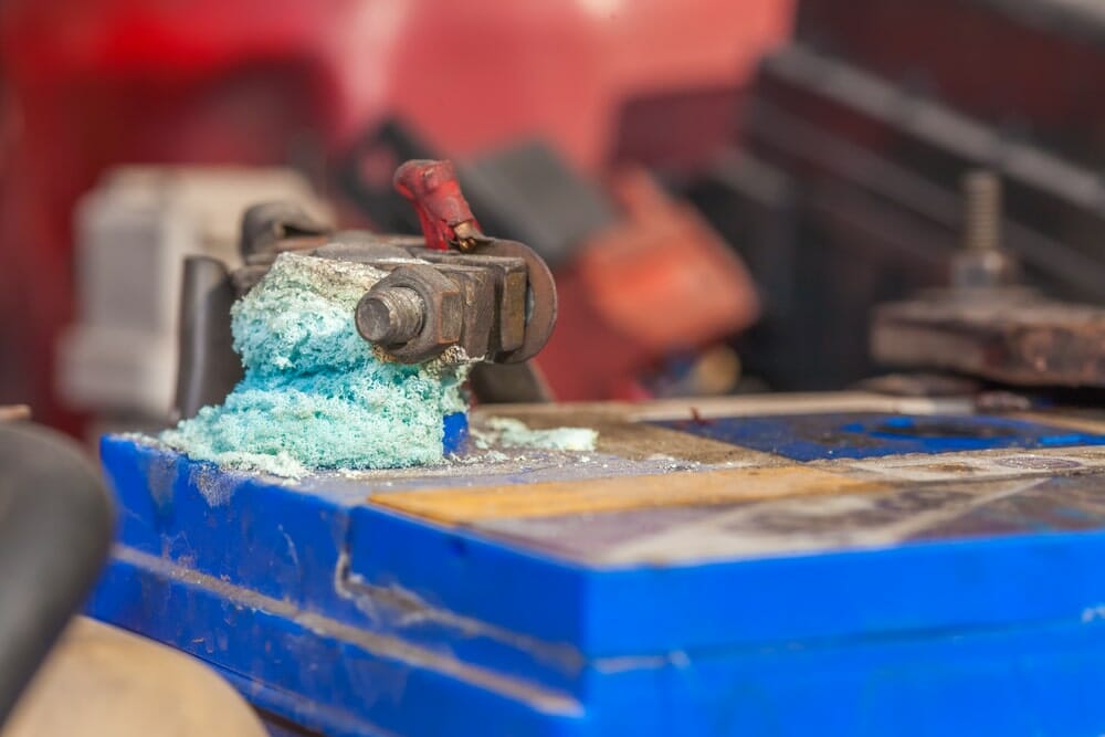 Car Battery Is Leaking From Top (Causes And Fixes)