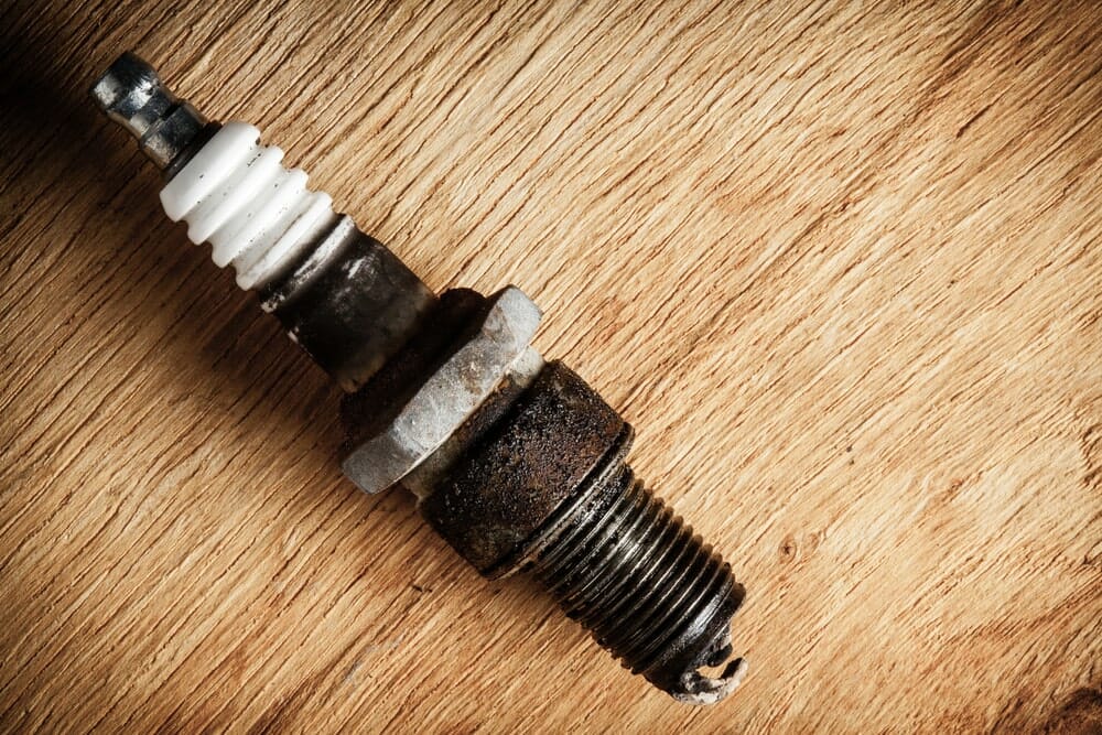 Oil Fouled Spark Plug (Causes And Fixes)