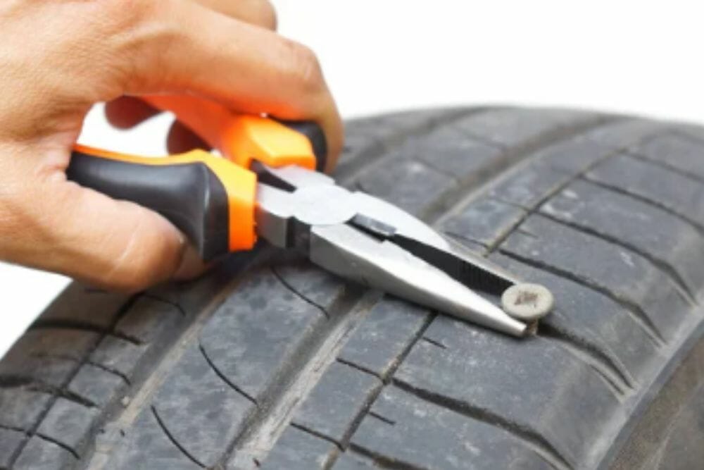 Nail In My Tire But Not Flat (What To Do & Is It Safe?)