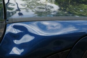 How To Get A Dent Out Of Your Car (7 Methods)